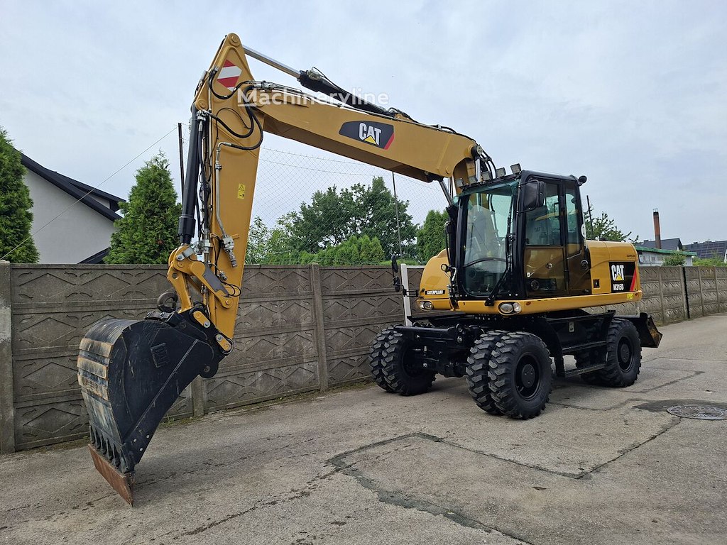 Caterpillar M 315D bager točkaš