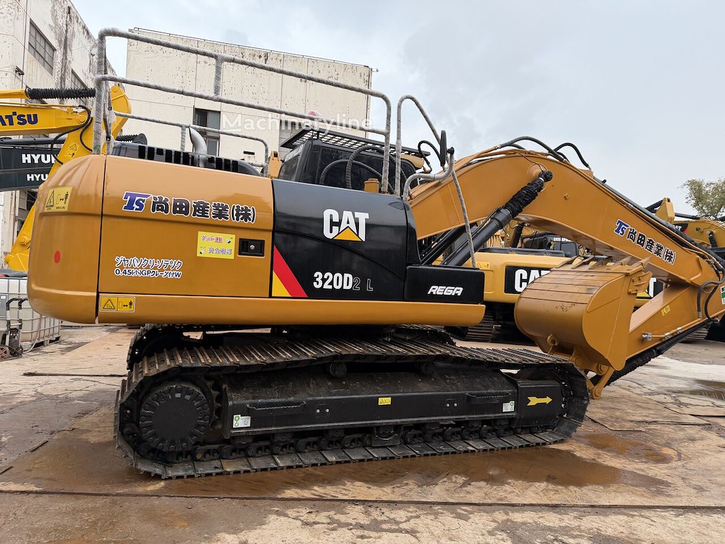 Caterpillar 320DL bager guseničar