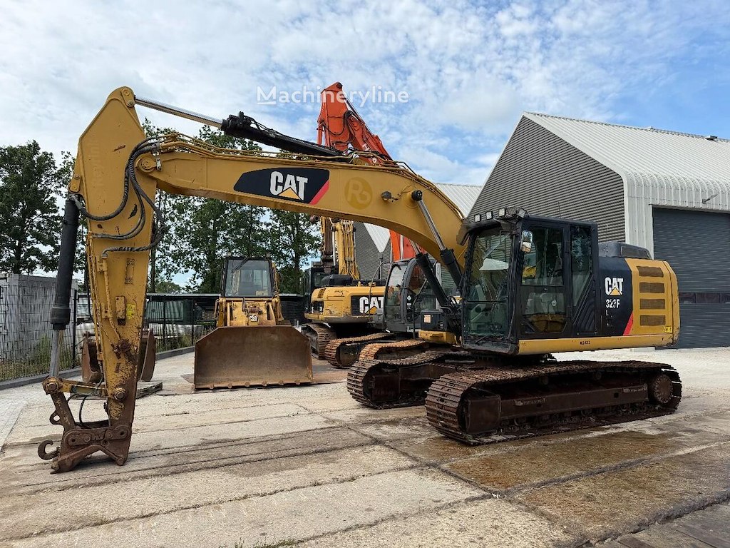 Caterpillar 323 EL bager guseničar