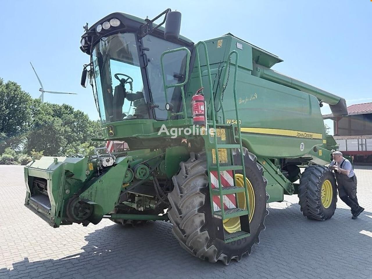 John Deere W540 mit Raspvorsatz kombajn za žito
