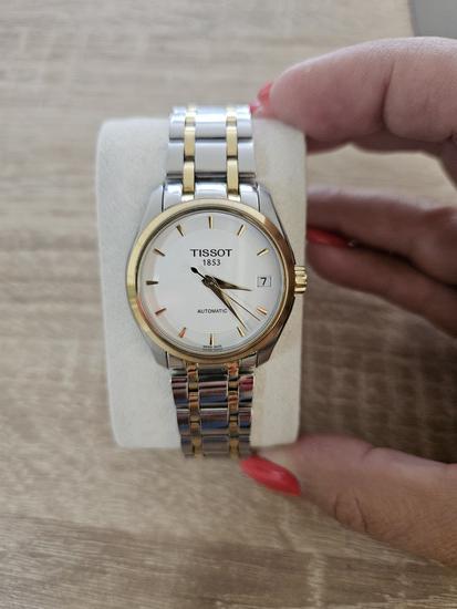 Tissot sat