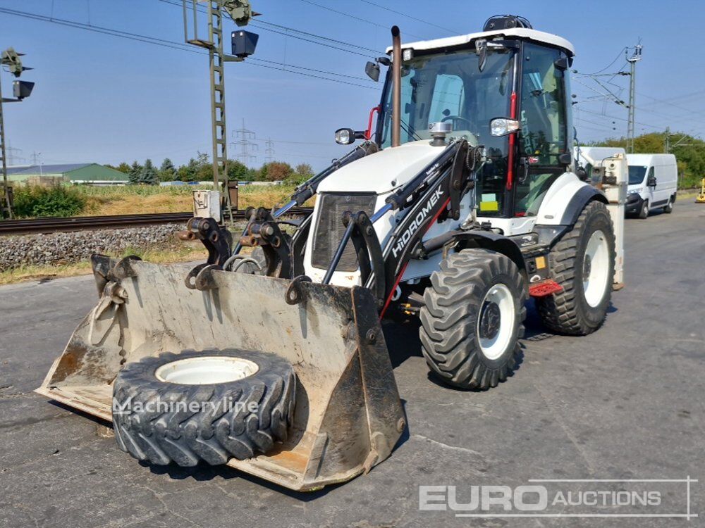 Prodaje se Hidromek HMK 102B bager-utovarivač na aukciji