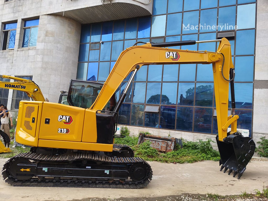 Caterpillar 310 bager guseničar