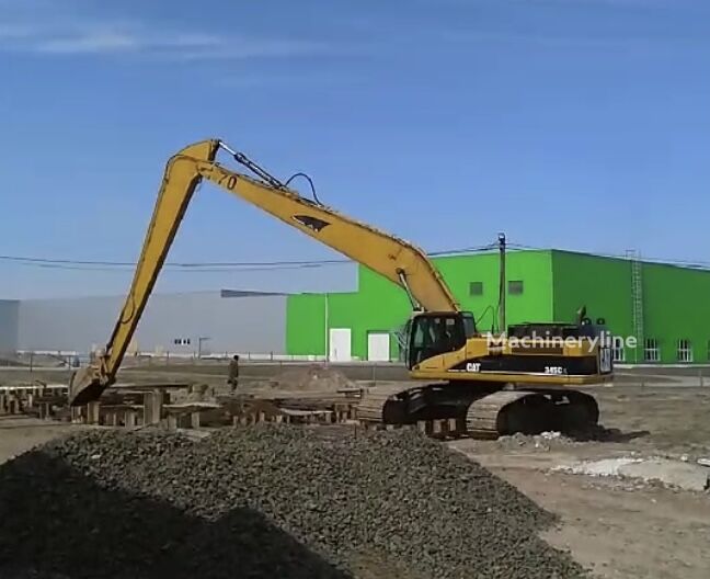 Caterpillar 345CL bager sa dugom strelom