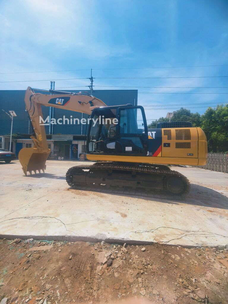 Caterpillar 320D bager guseničar