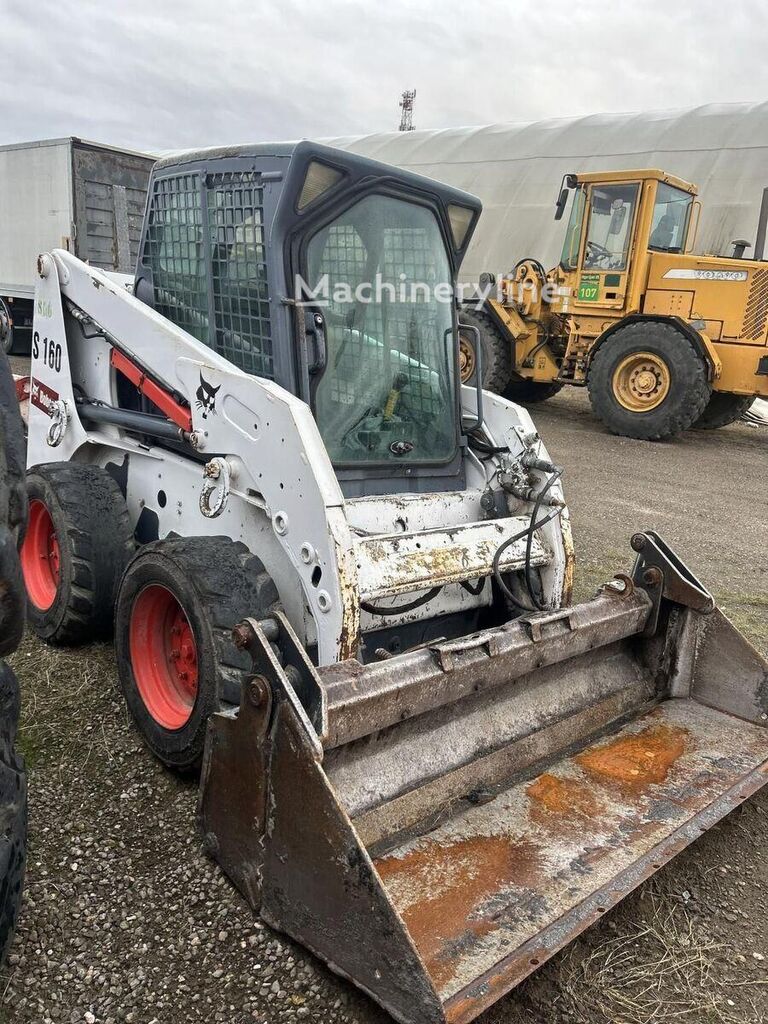 Bobcat S 160 nyitható kanál. hidraulika kiépítéssel mini utovarivač
