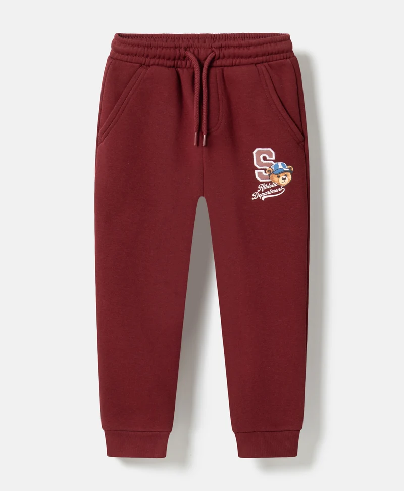 Sportske pantalone za dečake sa našivkom