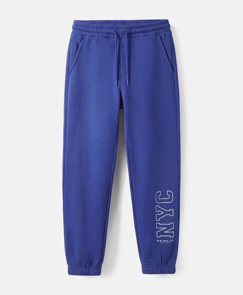 Sportske pantalone za dečake sa NYC printom