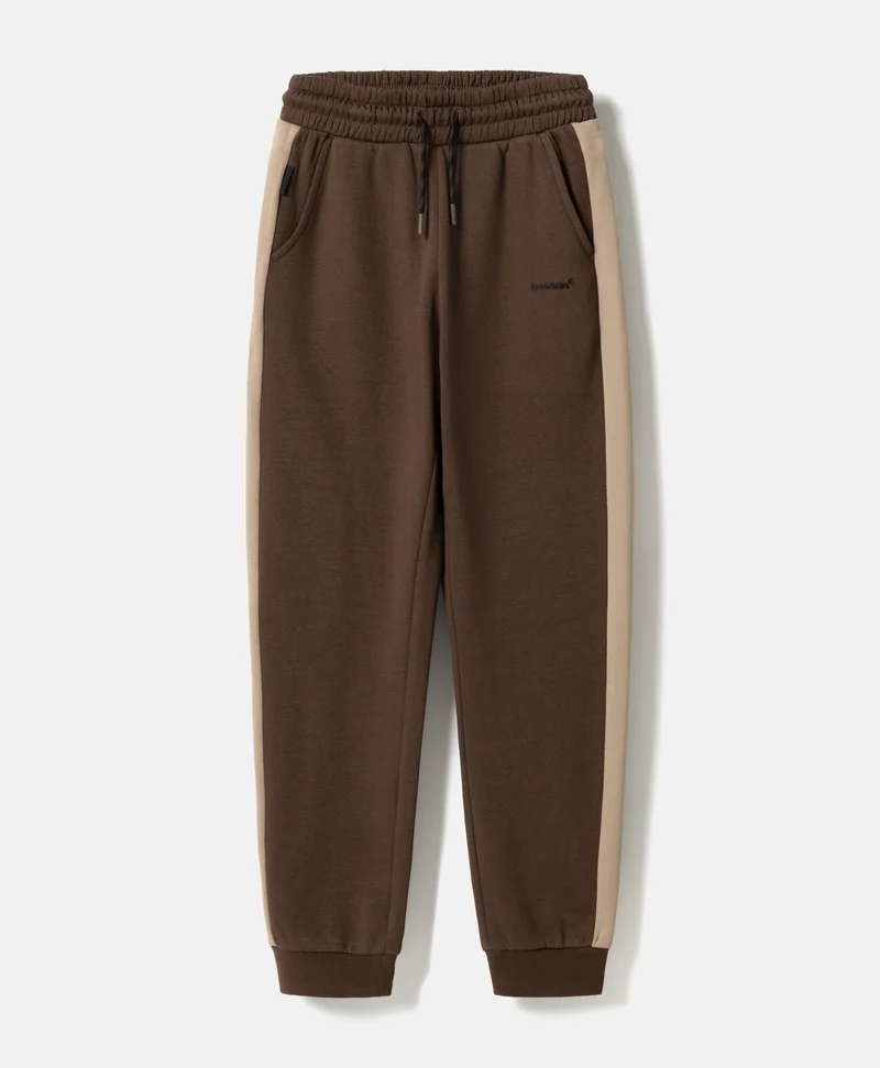 Sportske pantalone za dečake sa printom