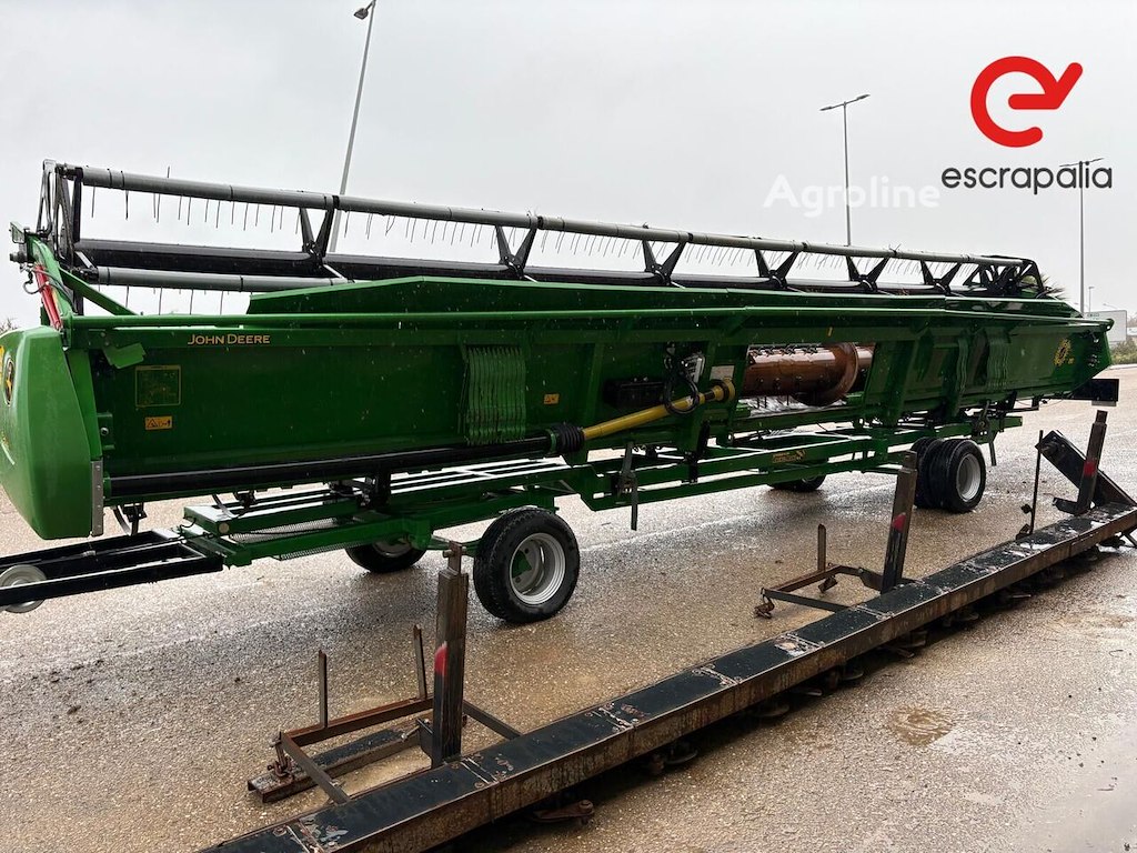 Prodaje se John Deere 635R adapter za žito na aukciji