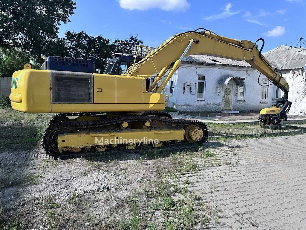 Komatsu 340 gusenični usnopljivač