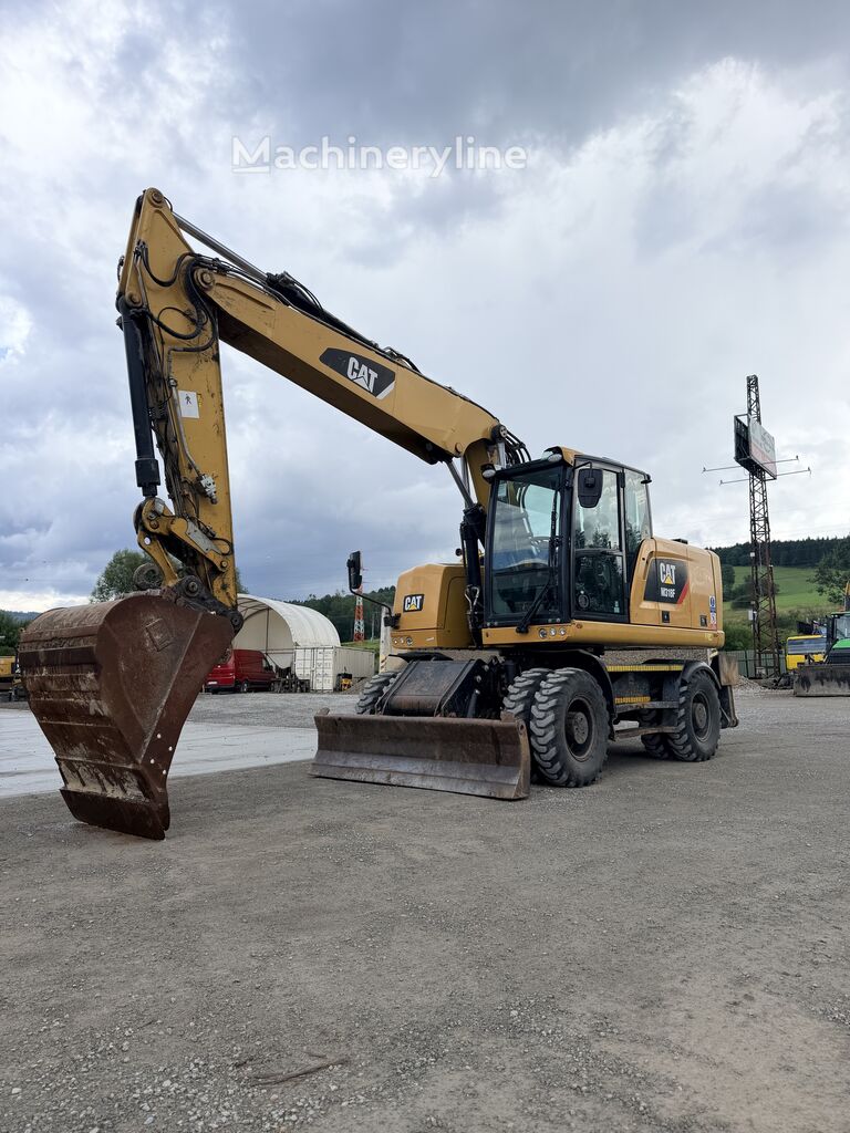 Caterpillar M318F bager točkaš