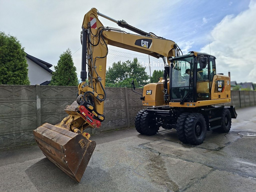 Caterpillar M314 bager točkaš