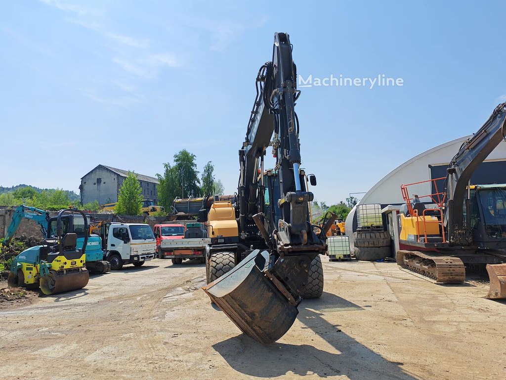 Volvo EW 140 bager točkaš