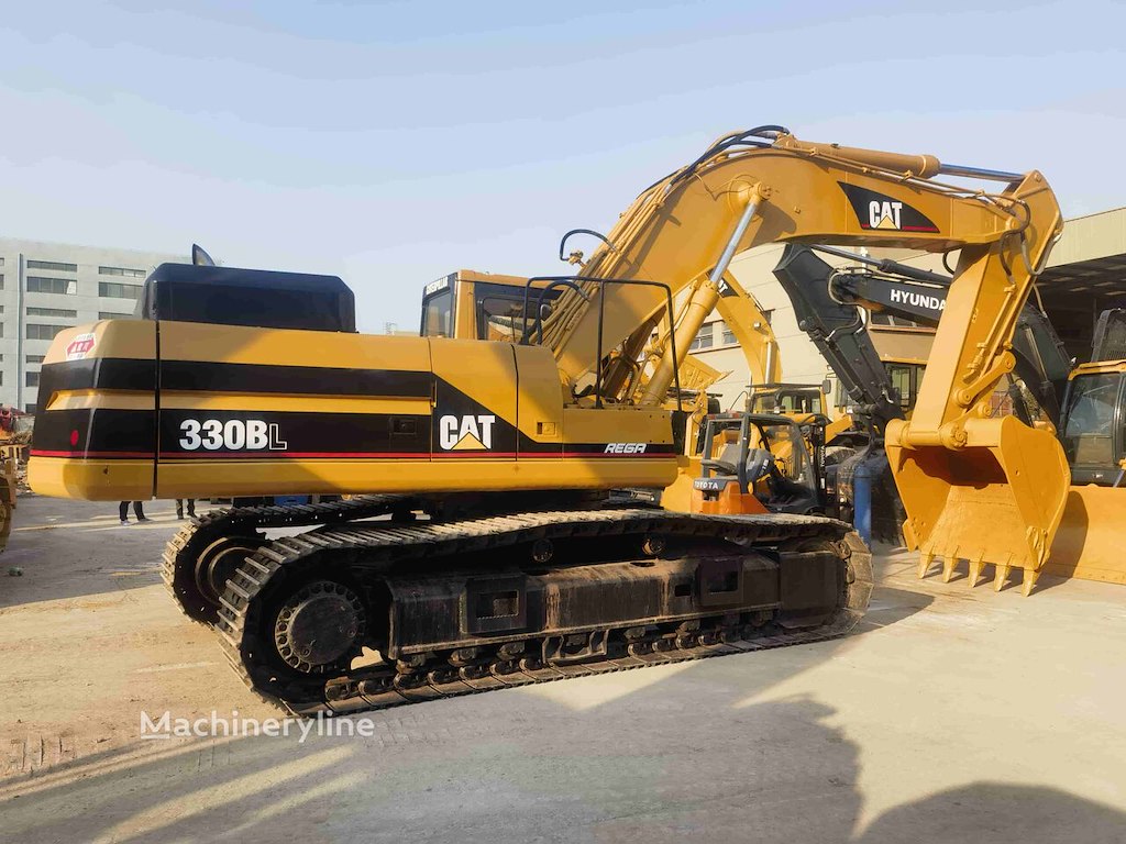 Caterpillar 330BL bager guseničar