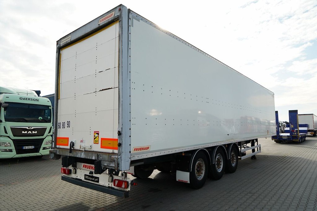 Fruehauf Koffer roller door semi-trailer furgon poluprikolica