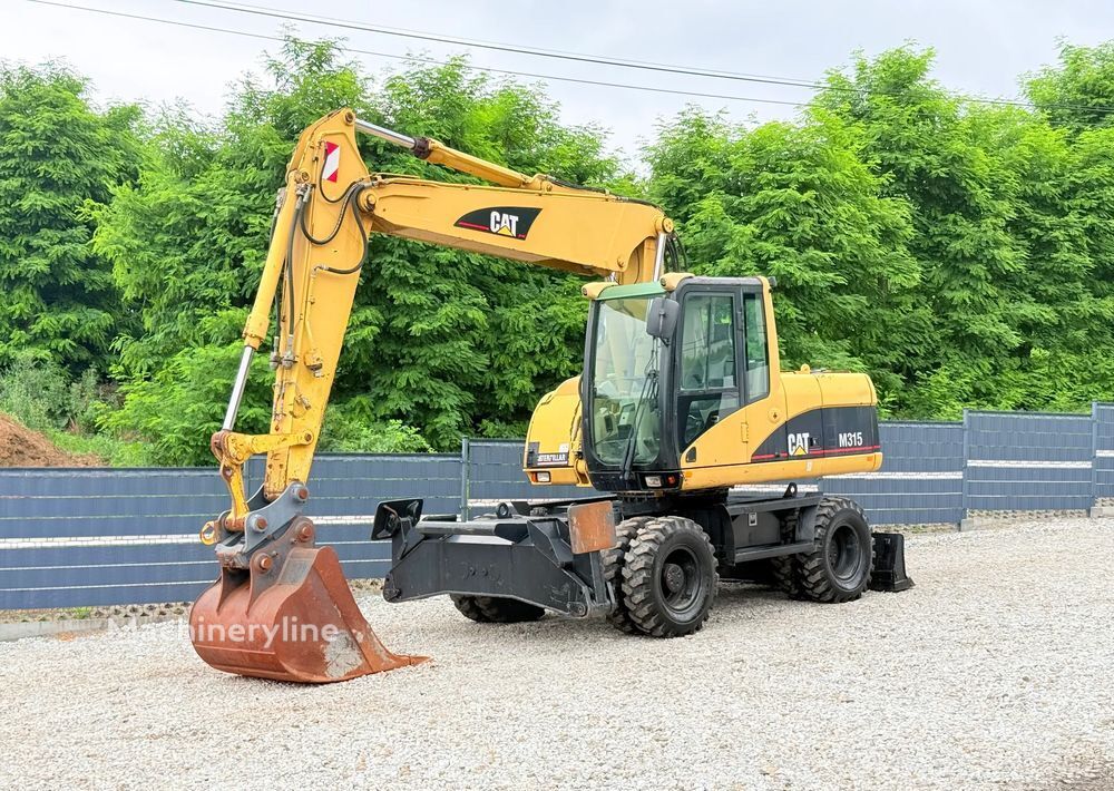 Caterpillar M315C bager točkaš