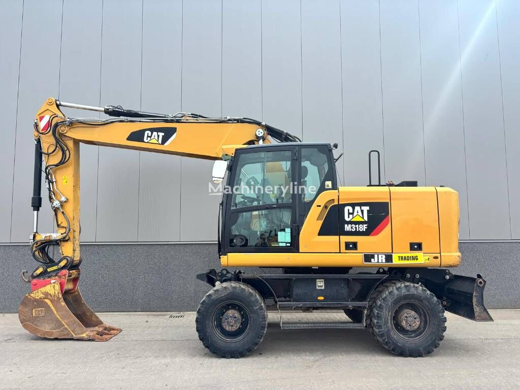 Caterpillar M 318 F bager točkaš