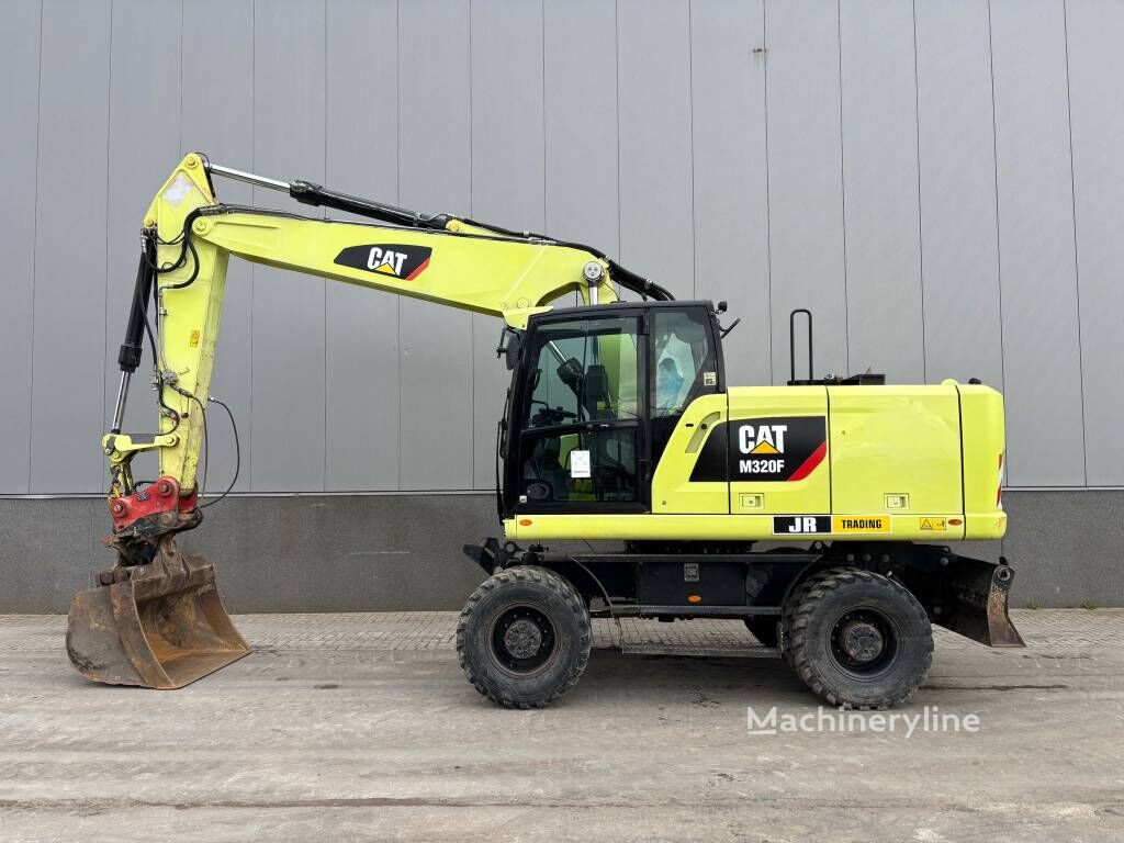 Caterpillar M 320 F bager točkaš