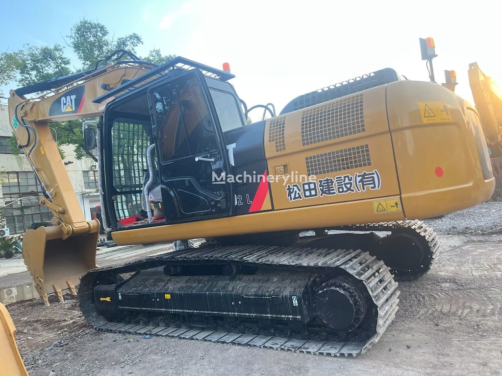 Caterpillar 324DL bager guseničar
