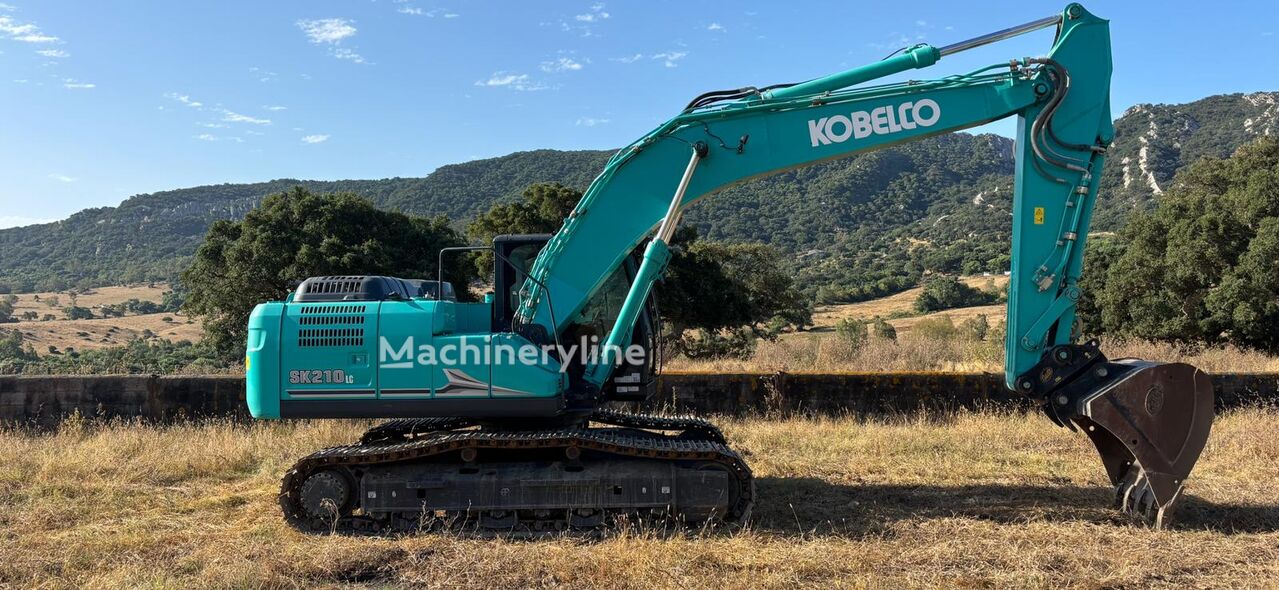 Kobelco SK210 bager guseničar