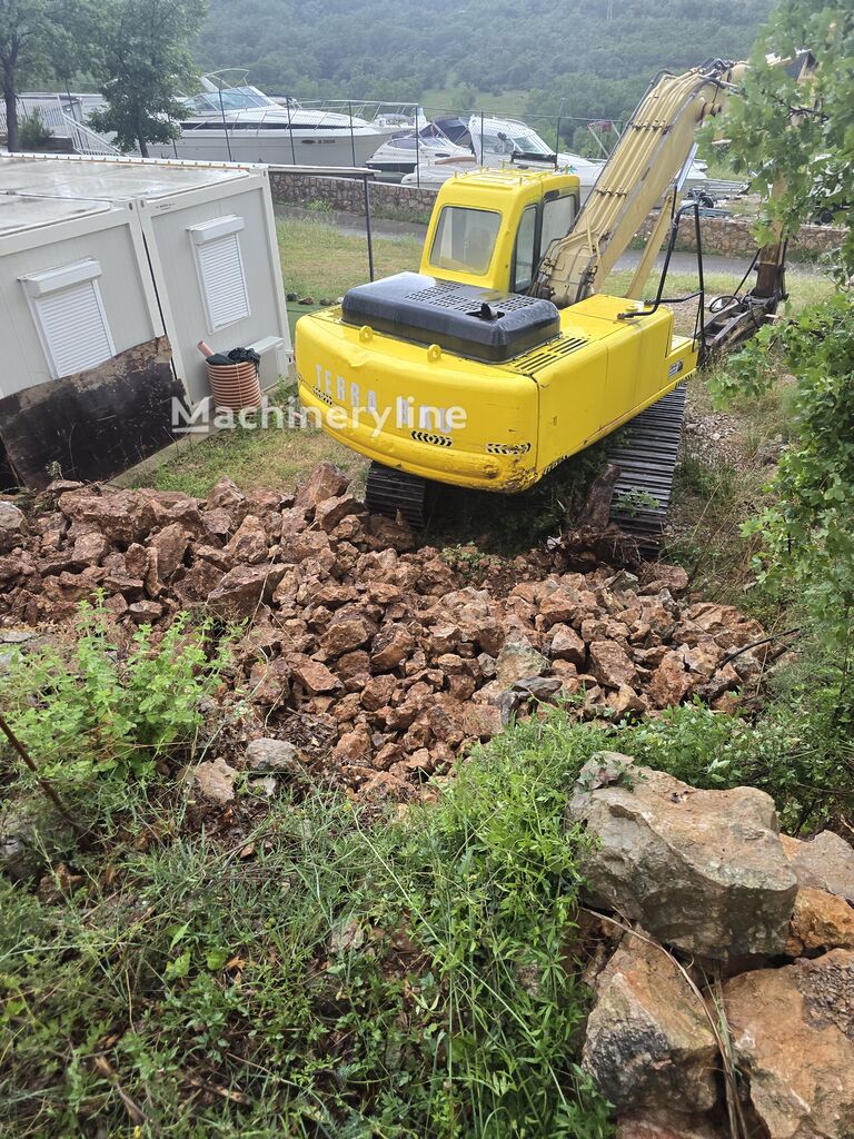 Komatsu PC210 bager guseničar