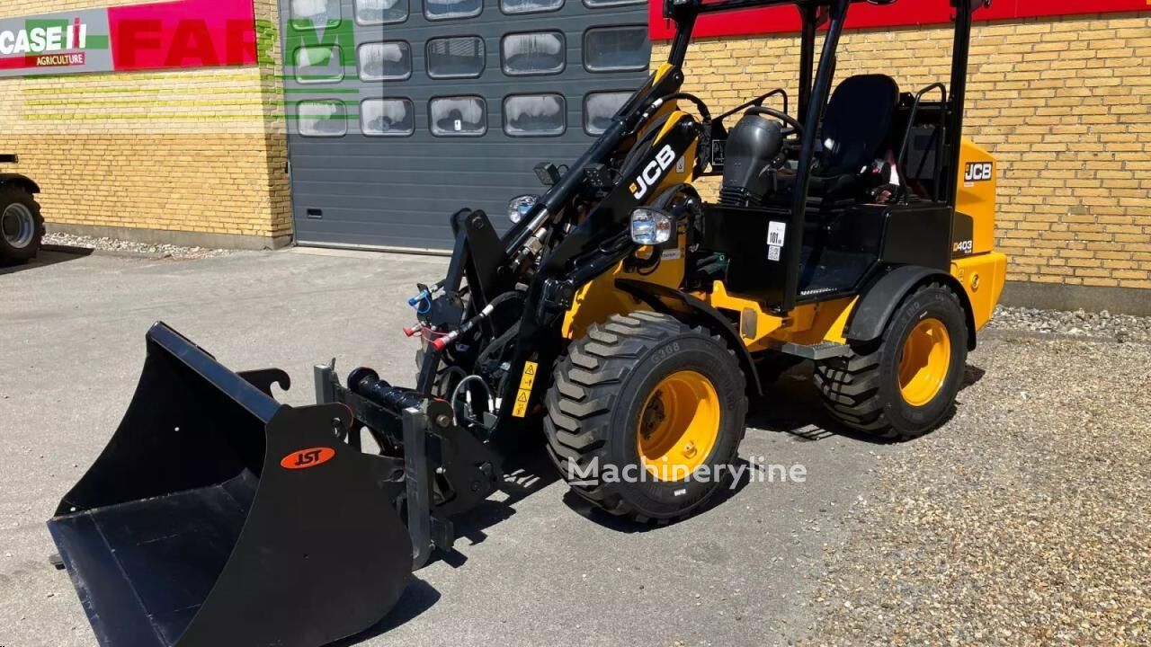 JCB 403 plus agri med jst skovl og pallegaffel multifunkcionalni utovarivač