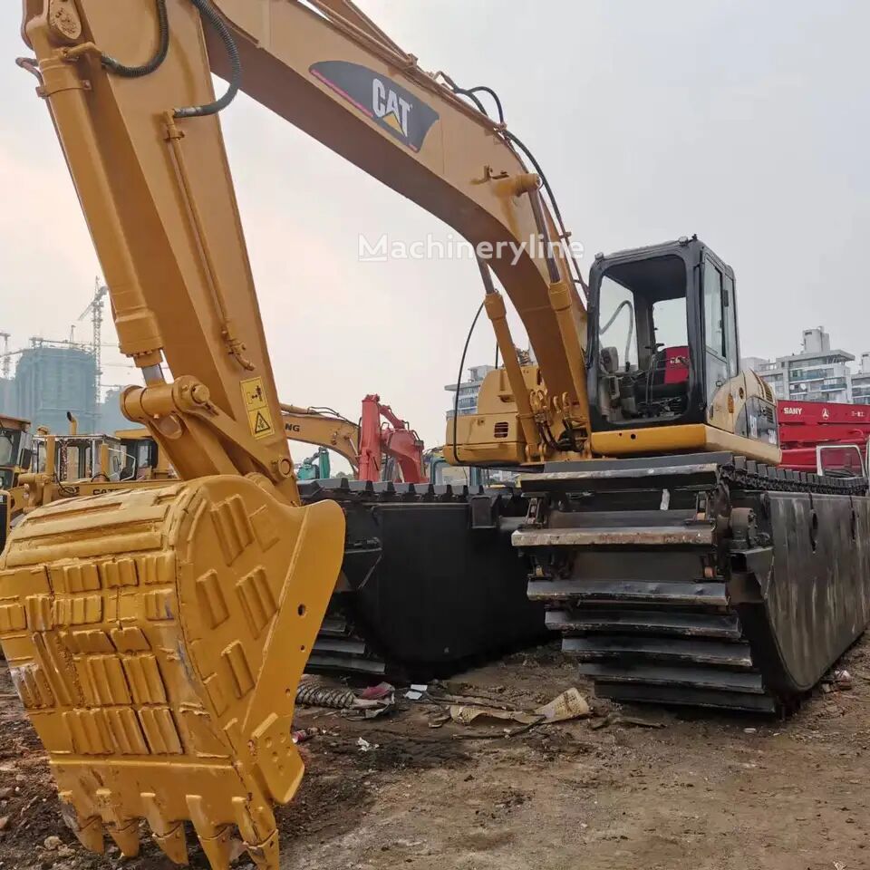 Caterpillar 320C bager amfibija