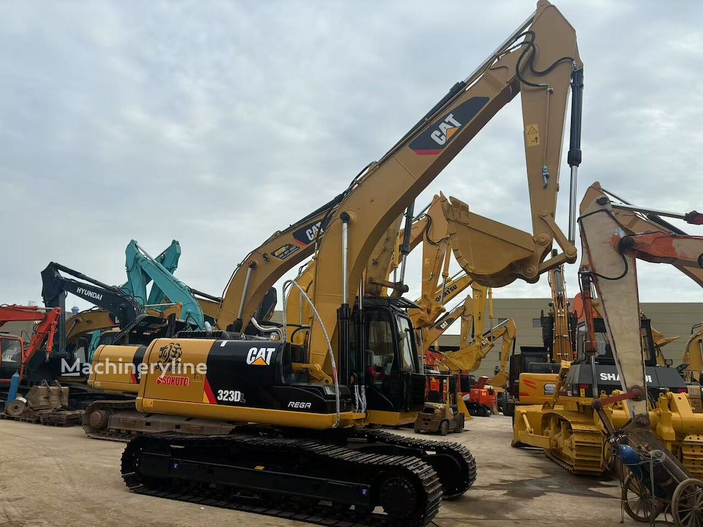 Caterpillar 323DL bager guseničar