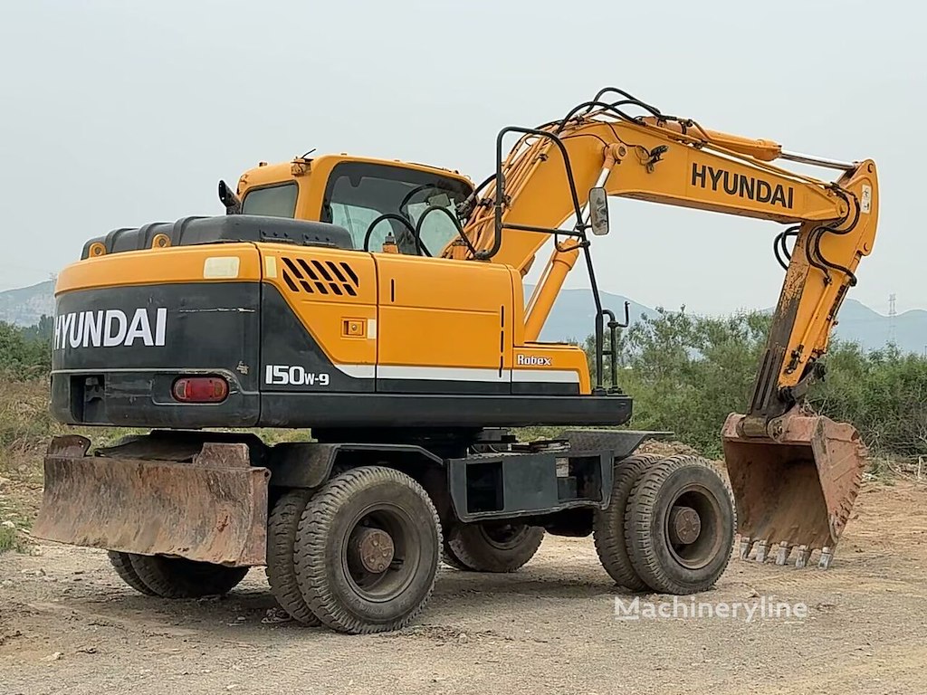 Hyundai 210W-9 bager točkaš