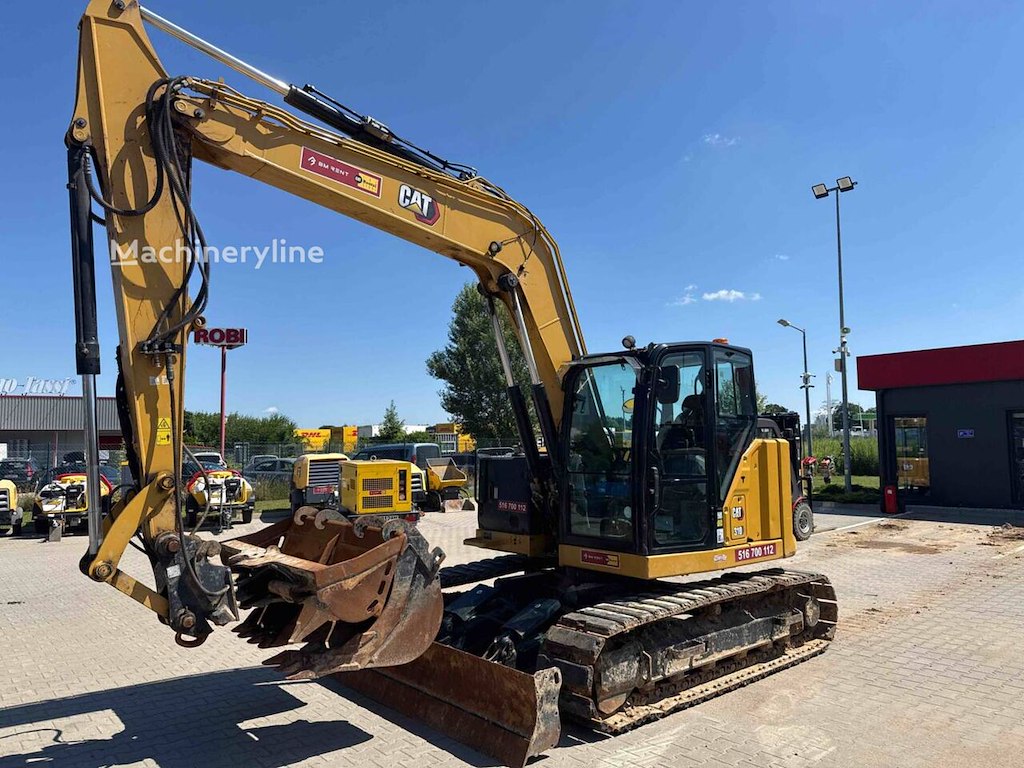 Caterpillar 31007 bager guseničar