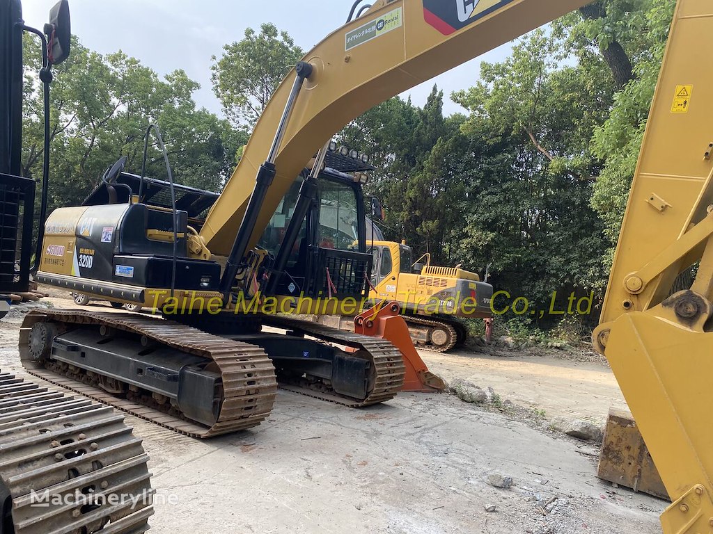 Caterpillar 320DL bager guseničar