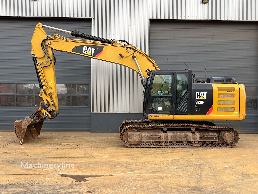 Caterpillar 320FL bager guseničar