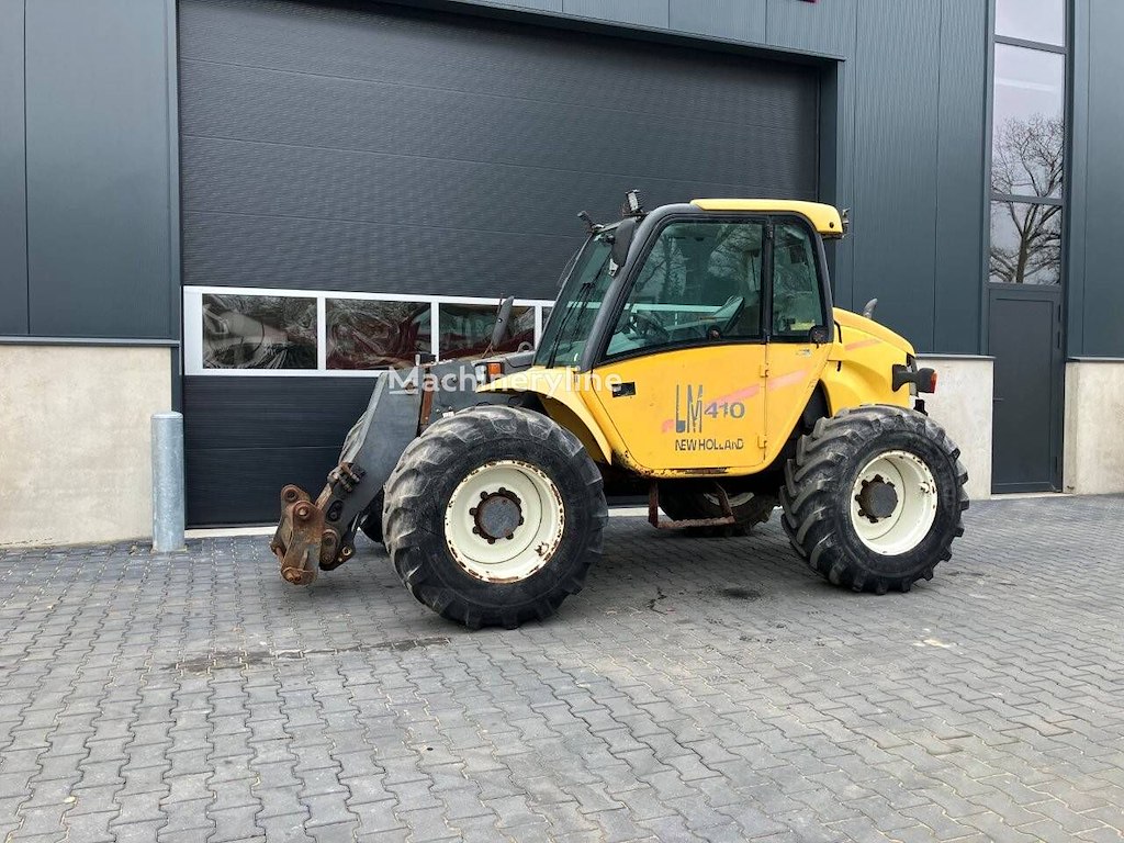 Prodaje se New Holland LM410 teleskopski utovarivač na aukciji