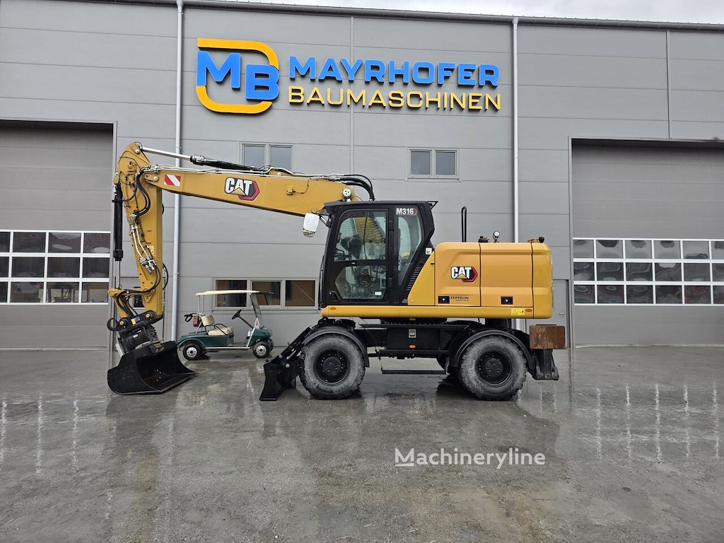 Caterpillar M316 bager točkaš