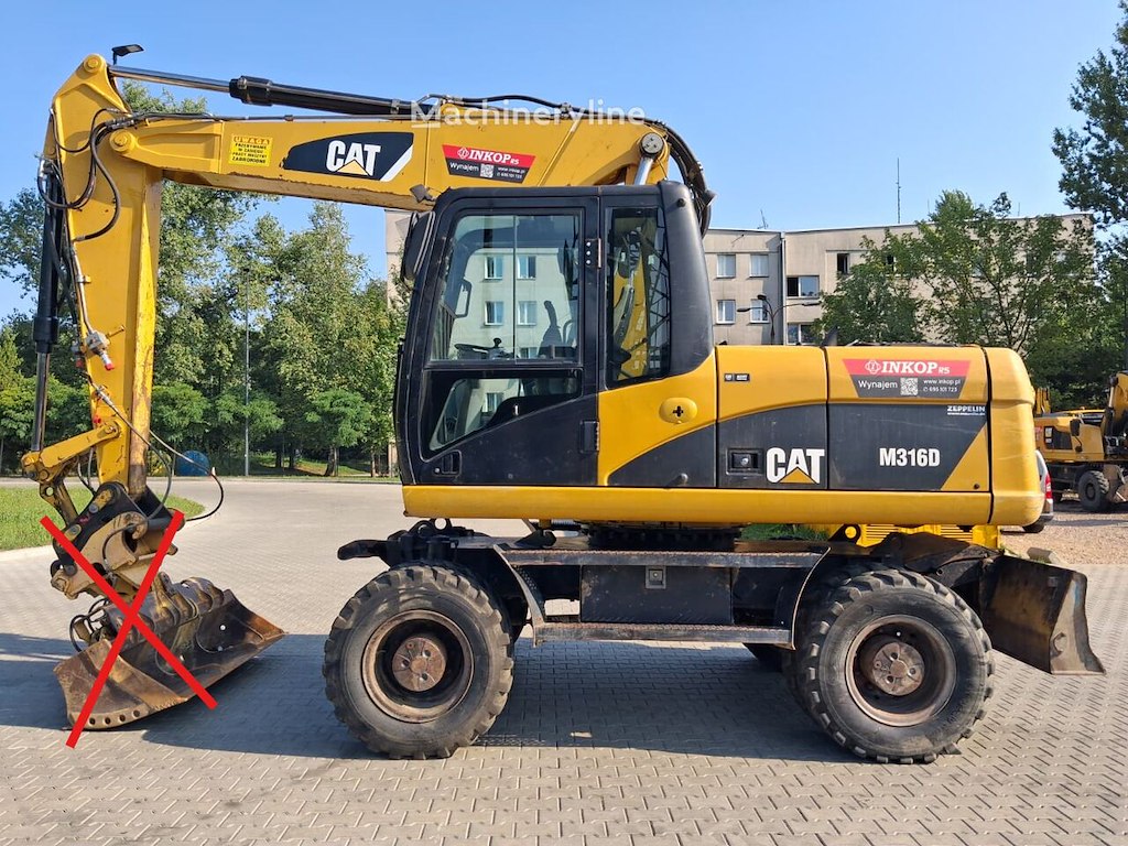 Caterpillar M316 bager točkaš