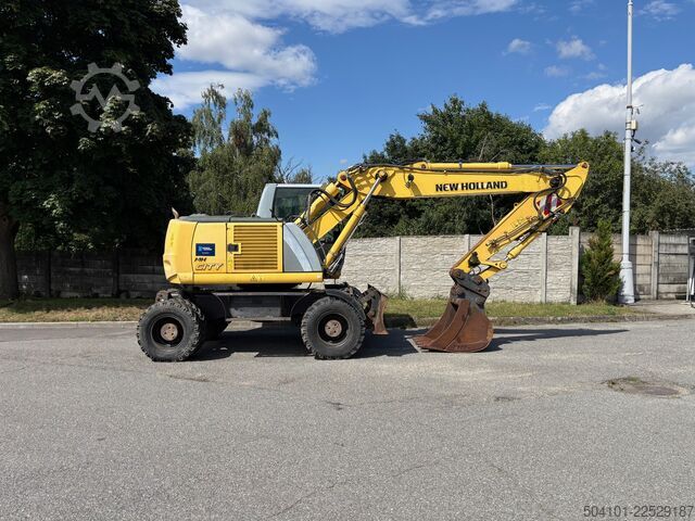 Točkaš bager 16T
New Holland MH City 16