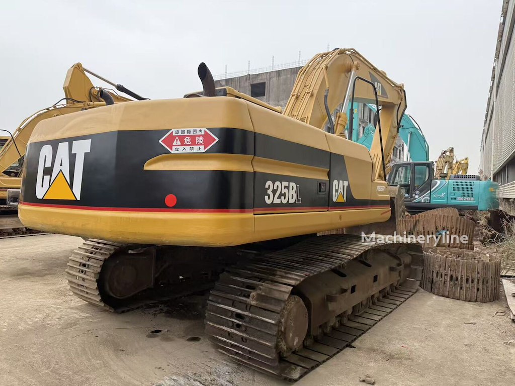 Caterpillar 325BL bager guseničar