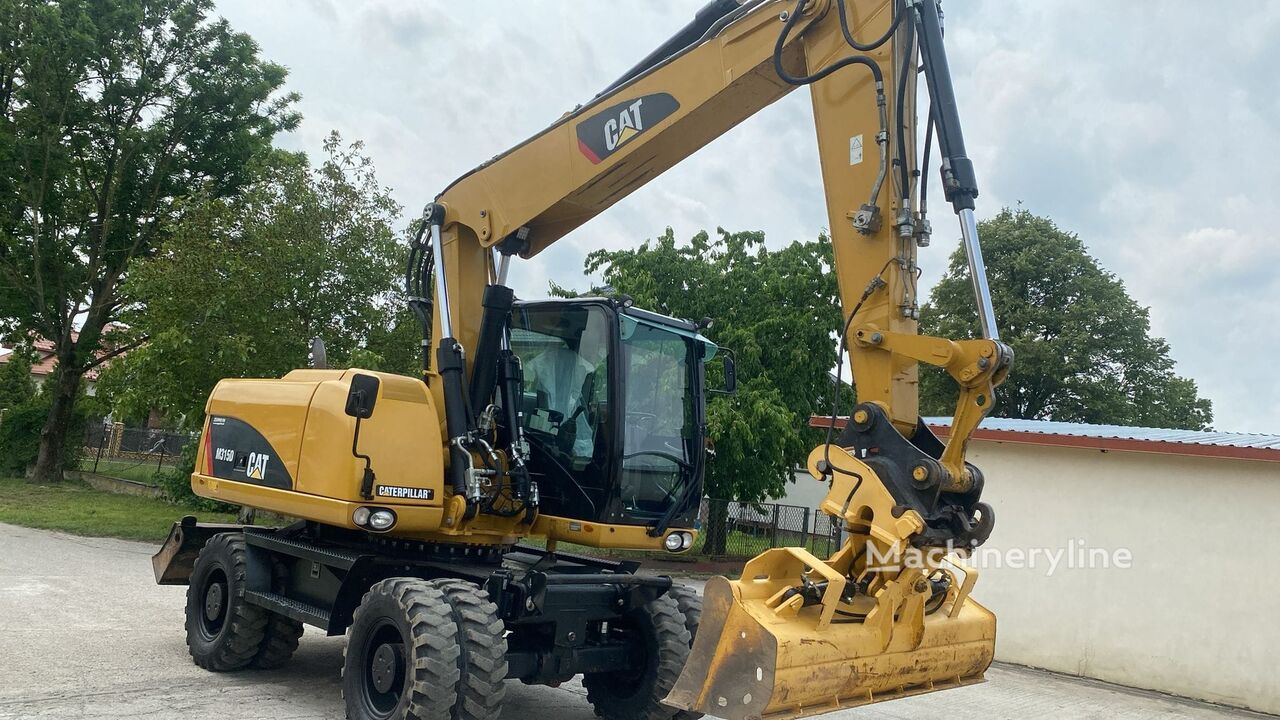 Caterpillar bager točkaš
