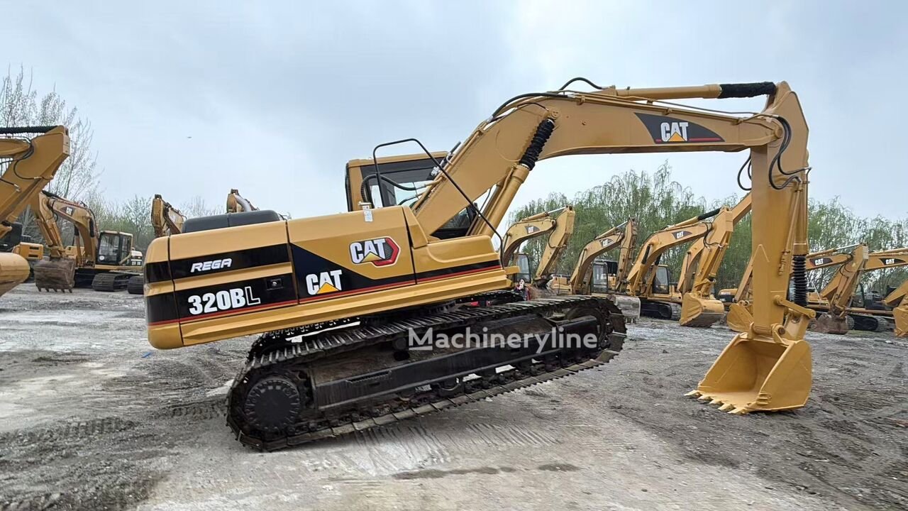Caterpillar 320BL bager guseničar