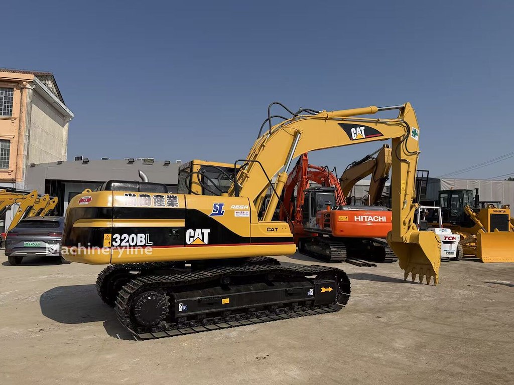 Caterpillar 320BL bager guseničar