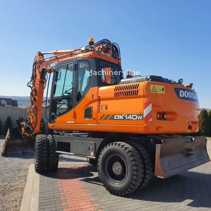 Doosan DX140W bager točkaš