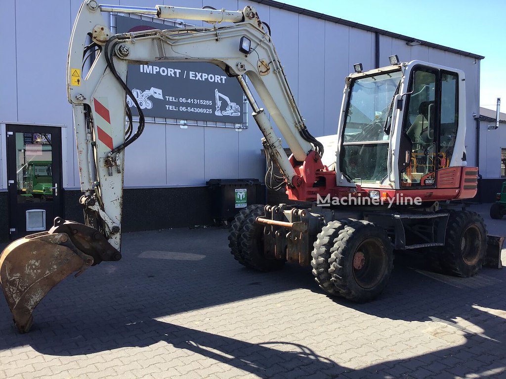 Takeuchi TB295W bager točkaš