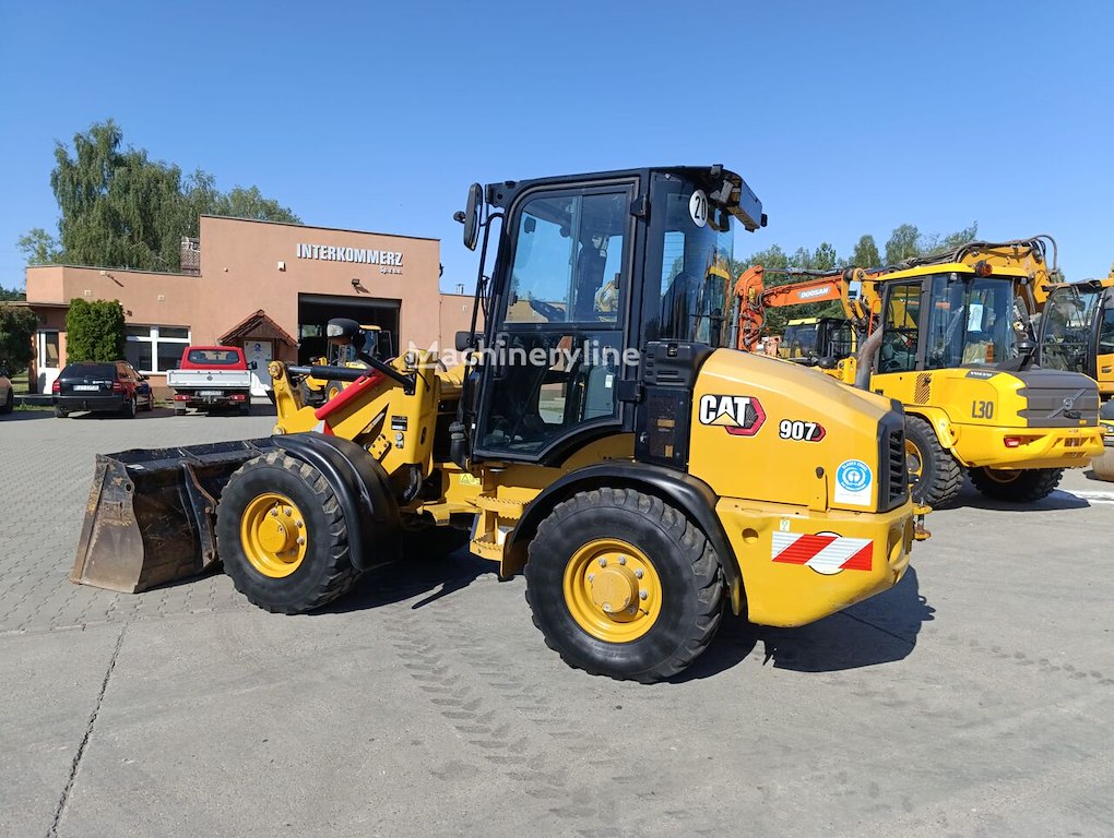 Caterpillar 907 prednji utovarivač