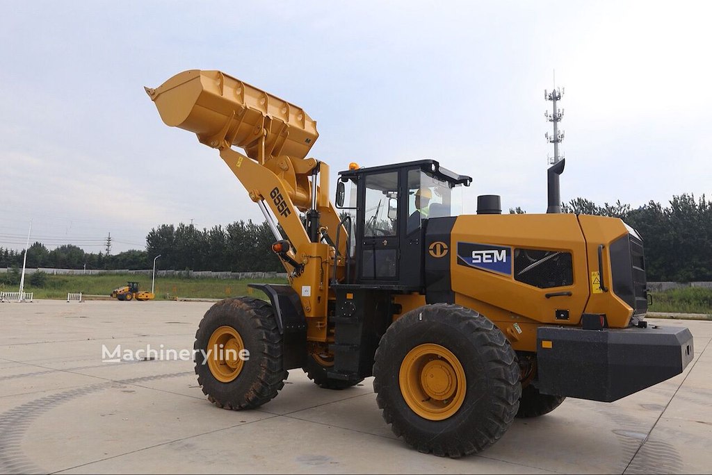 Caterpillar 655 prednji utovarivač