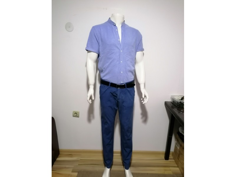 DAMAGED plave sportske pantalone vel.34-L