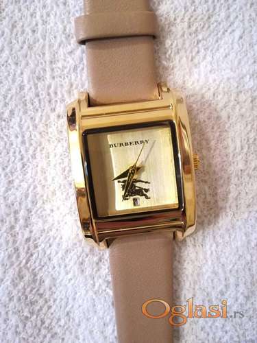Odlican zenski rucni sat poznate marke Burberry Novo