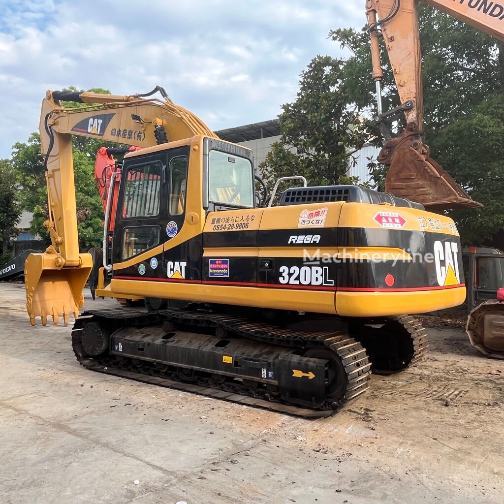 Caterpillar 320BL bager guseničar