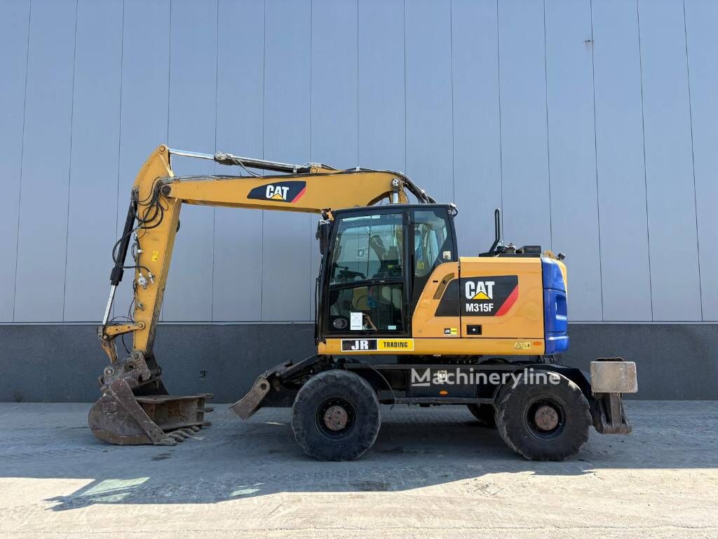 Caterpillar M 315 F bager točkaš