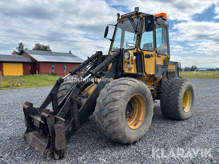 Prodaje se Caterpillar IT12 Z prednji utovarivač na aukciji